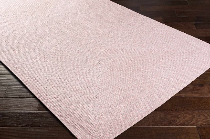 solid light pink area rug